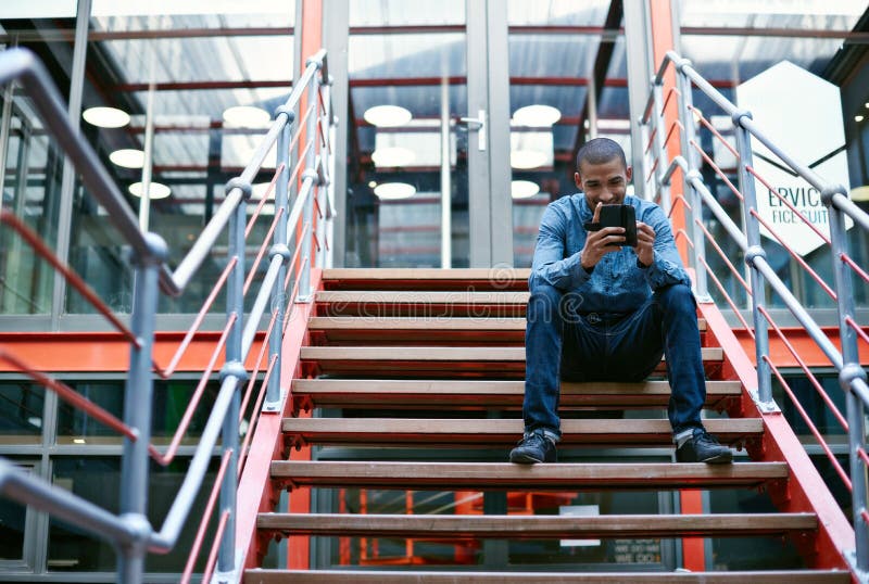 Its always Good Getting Positive Feedback. a Handsome Young Man Using ...