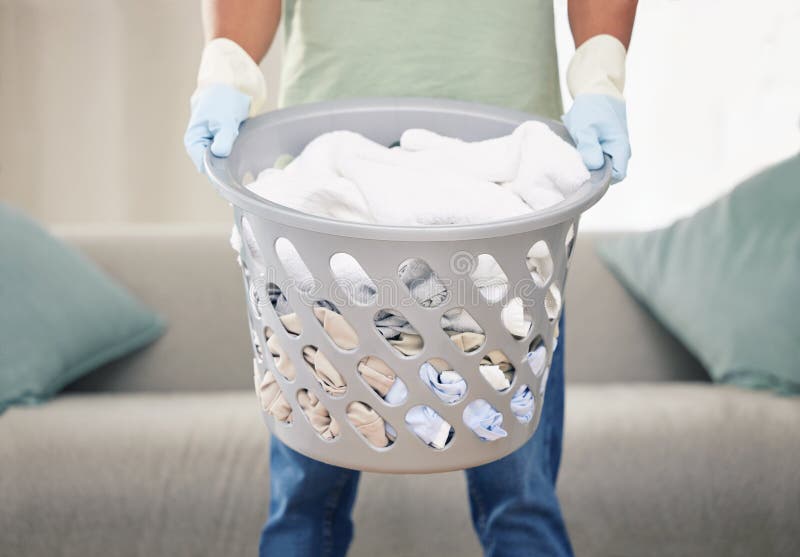 Its a Great Day for Some Clean Laundry. Shot of a Man Holding a Basket ...