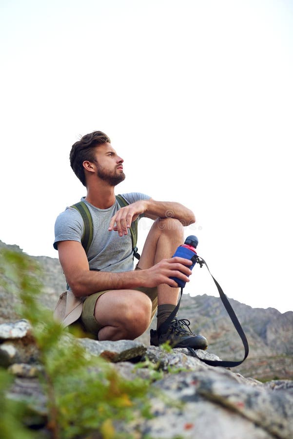 Its Great Out Here. a Handsome Young Man Enjoying the View while Hiking ...