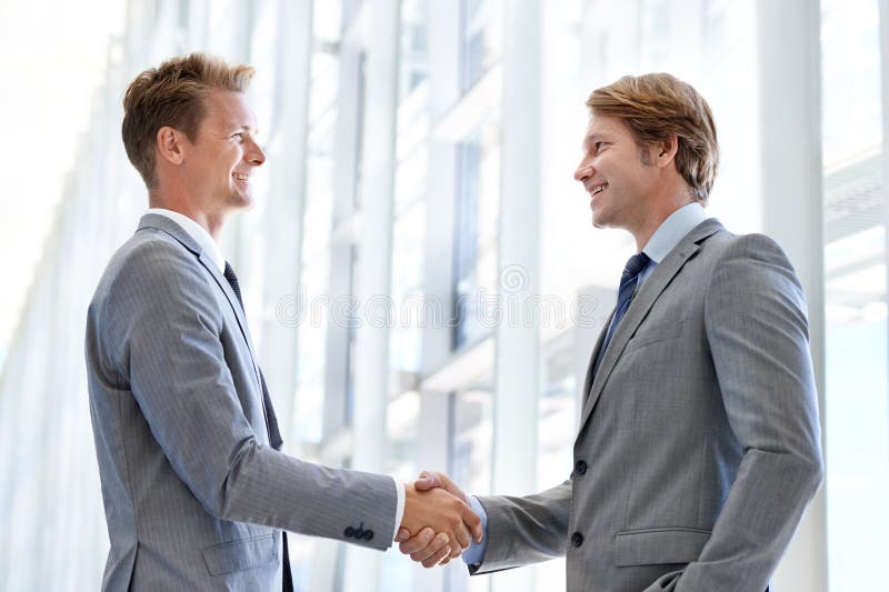 Its Not a Deal until we Shake on it.Two Businessmen Shaking Hands ...