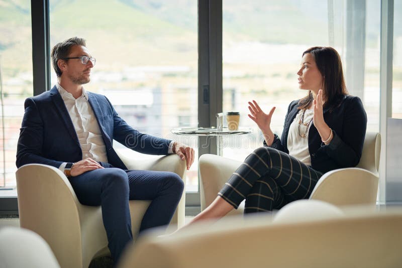 Its a Partnership Built on Communication. Two Businesspeople Talking in ...