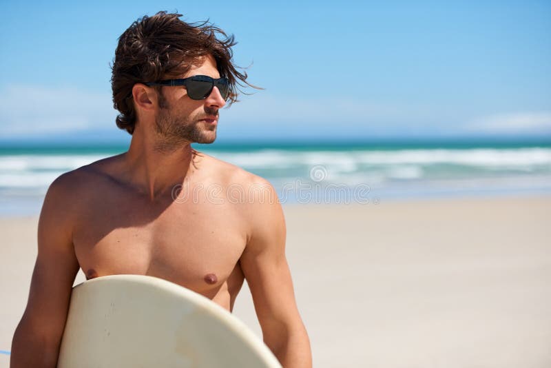 Its Time To Hit the Waves. an Attractive Young Man about To Go Surfing ...