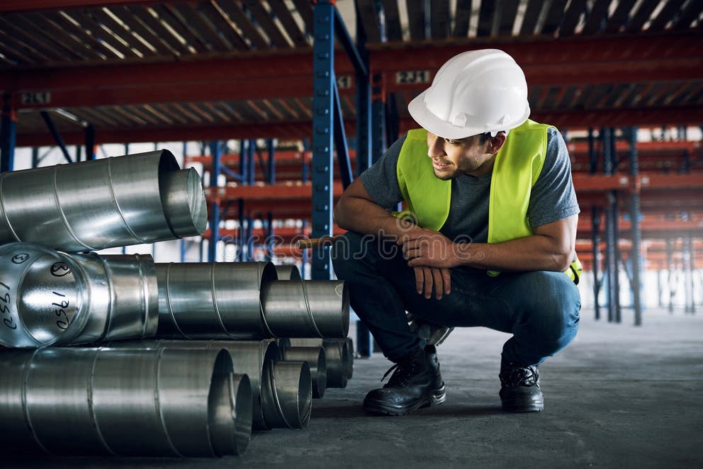 Its Whats Inside that Counts. a Young Man Doing Inspections at a ...