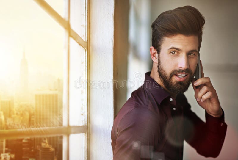 Its Your Call To Make. a Businessman Making a Call in His Office. Stock ...