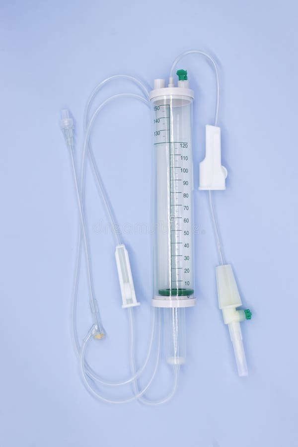IV Administration Set with Dosing Container on Blue Background Stock ...