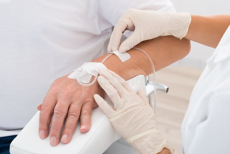 Iv Drip Inserted in Patient`s Hand Stock Photo - Image of care ...
