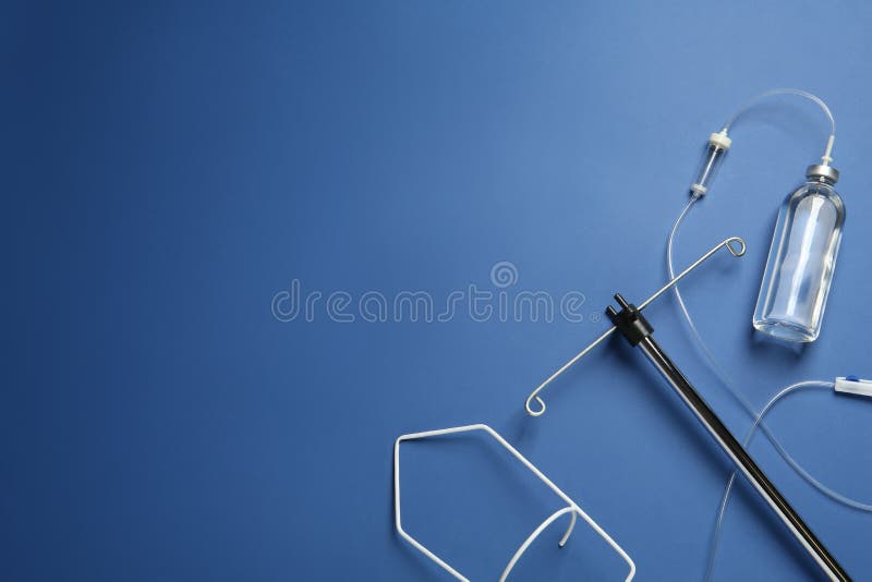 IV Infusion Set on Blue Background, Flat Lay. Space for Text Stock ...