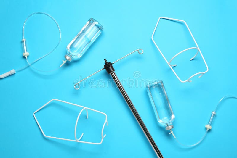 IV Infusion Set on Light Blue Background, Flat Lay Stock Image - Image ...