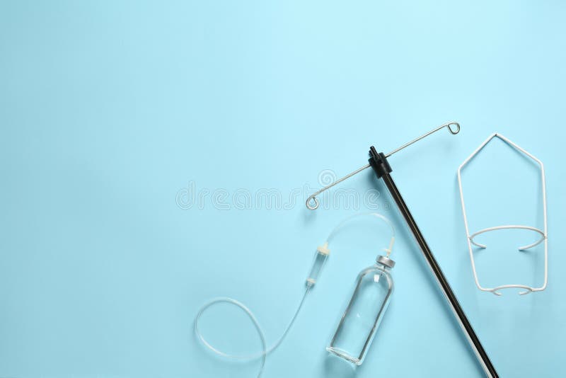 IV Infusion Set on Light Blue Background, Flat Lay. Space for Text ...
