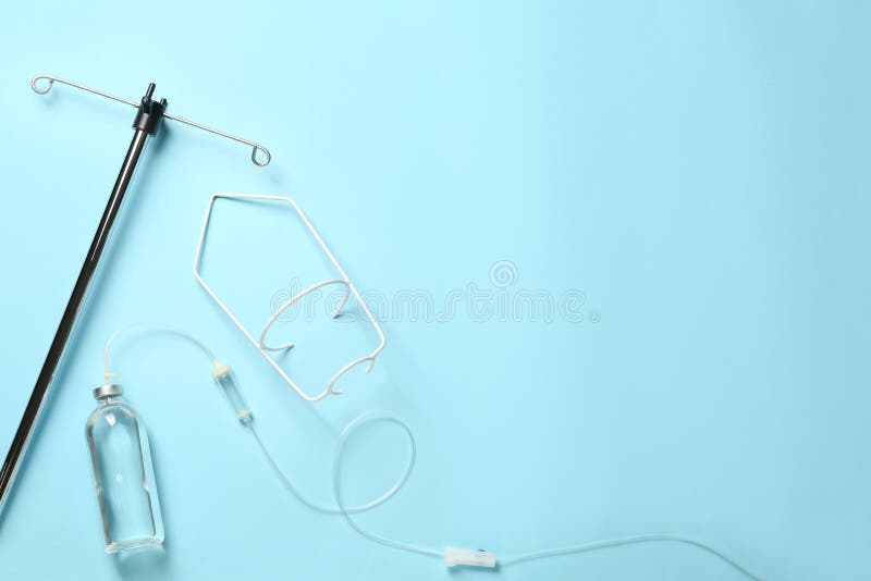 IV Infusion Set on Light Blue Background, Flat Lay. Space for Text ...