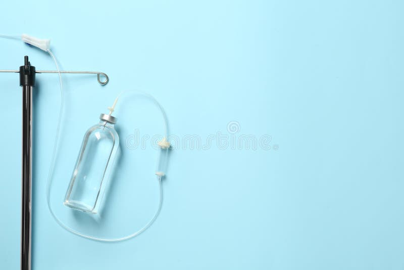 IV Infusion Set on Light Blue Background, Flat Lay. Space for Text ...