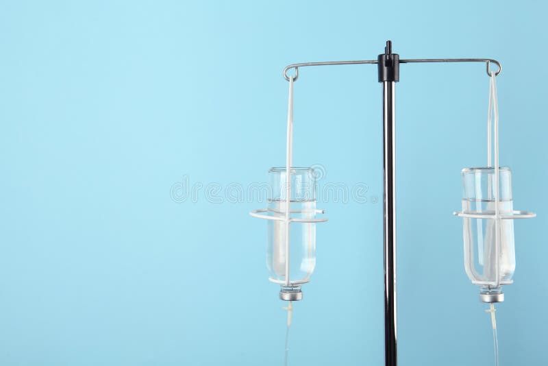 IV Infusion Set on Light Blue Background. Space for Text Stock Image ...