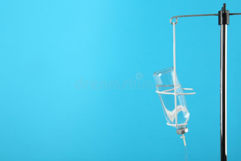 IV Infusion Set on Light Blue Background. Space for Text Stock Photo ...