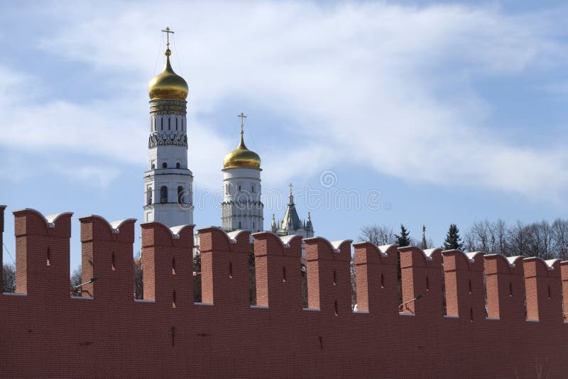 Ivan the Great Bell Tower with Golden Cupolas Behind the Red Brick ...