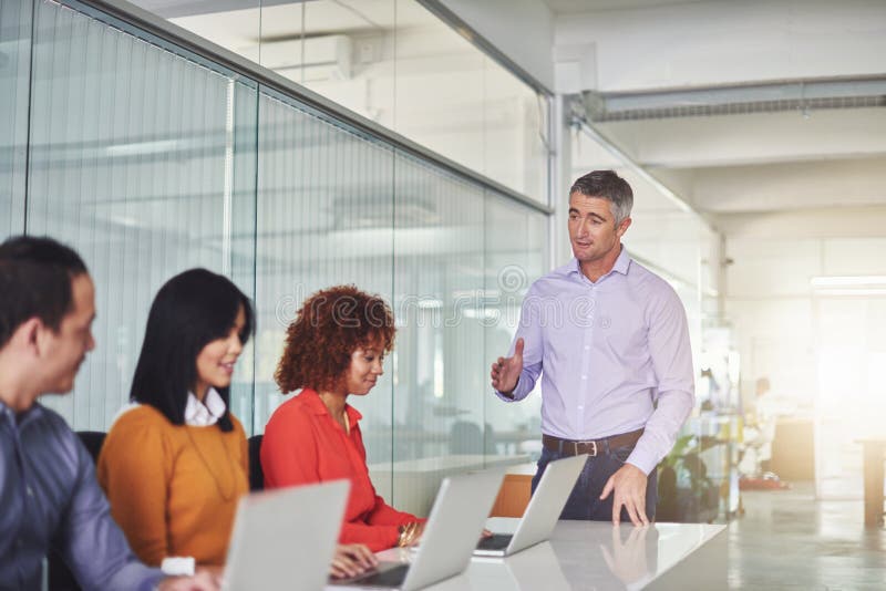 Ive Got a Few Tips for You. a Man Addressing His Employees in the ...