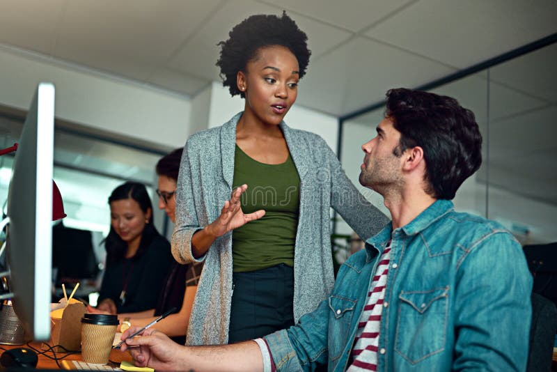 Ive Got it. Two Young Designers Talking in the Office. Stock Image ...