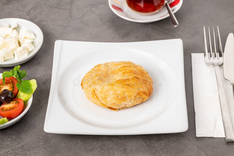 Izmir Boyoz on a White Porcelain Plate on a Stone Table Stock Image ...
