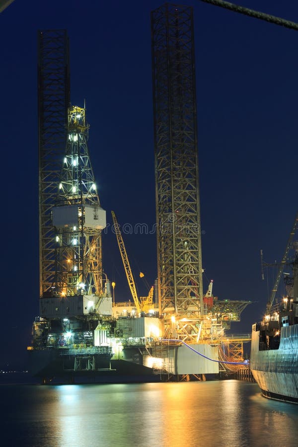 Jack Up Oil Drilling Rig in the Shipyard in the Evening Stock Image ...