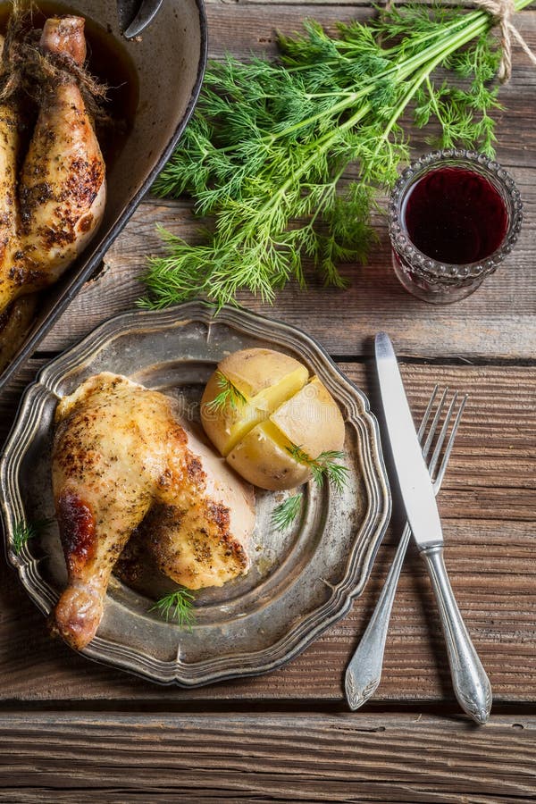 Jacket Potato and Roasted Chicken Served with Wine Stock Image - Image ...