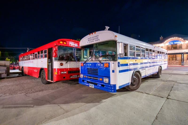 Jackson Hole, WY - July 10, 2019: Public Buses at the Parking at Night ...