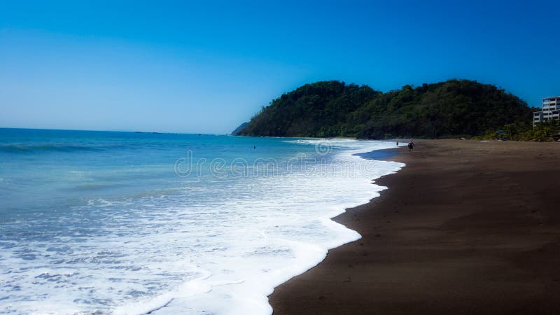 Jaco beach stock image. Image of sand, blue, jaco, town - 67055311