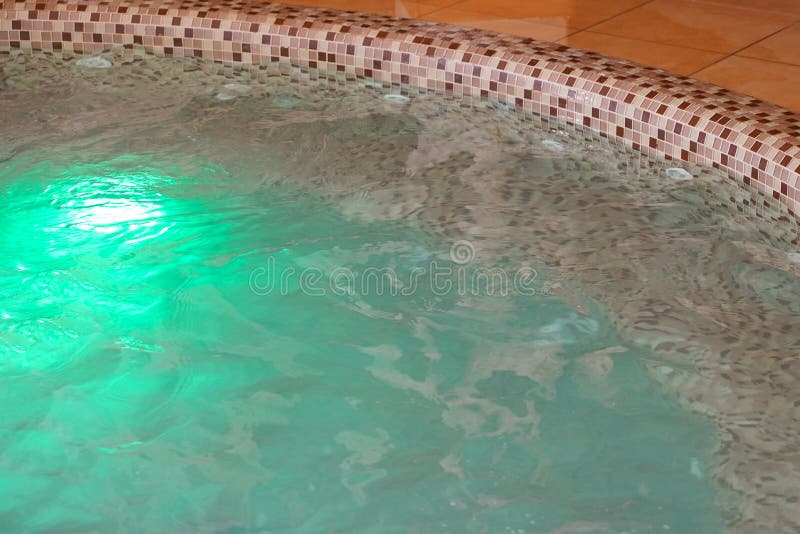 Jacuzzi Bath with Hot Water and a Jet of Water with Bubbles with a ...