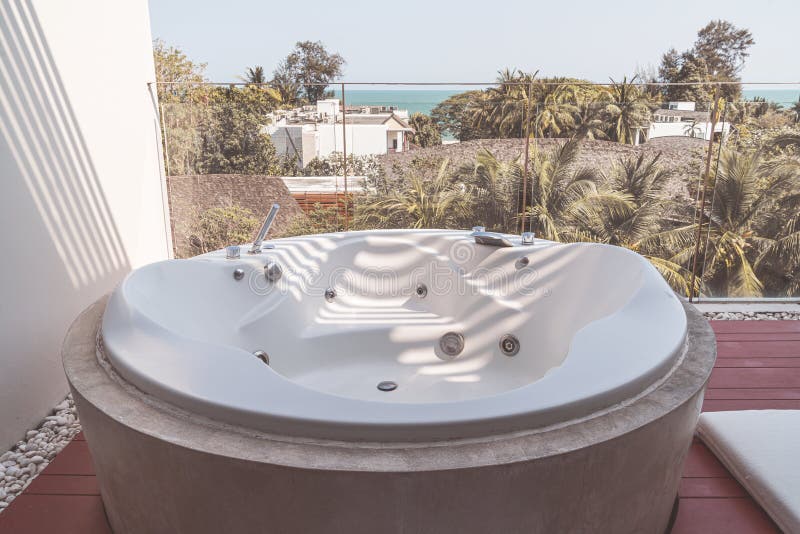 Jacuzzi Bath Tub on Balcony Stock Photo - Image of blue, floor: 177283776