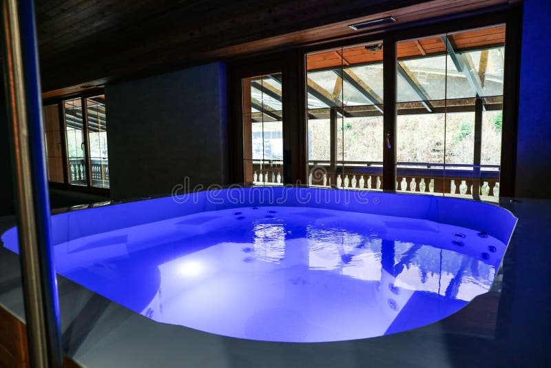 Jacuzzi with Blue Light in Beautiful Hotel Stock Photo - Image of aqua ...
