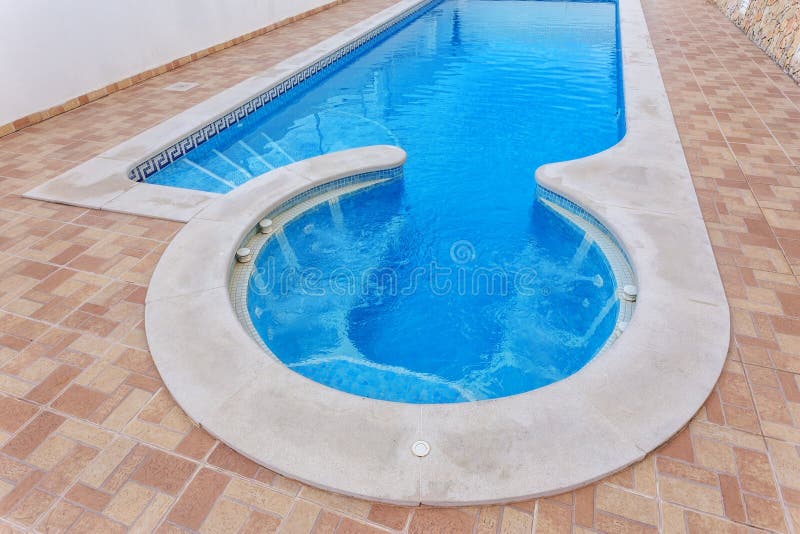 Jacuzzi built in the pool. stock photo. Image of backyard - 83285646