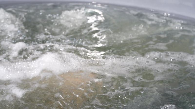 Jacuzzi and a Hand Lifting Up Some Water Stock Footage - Video of relax ...