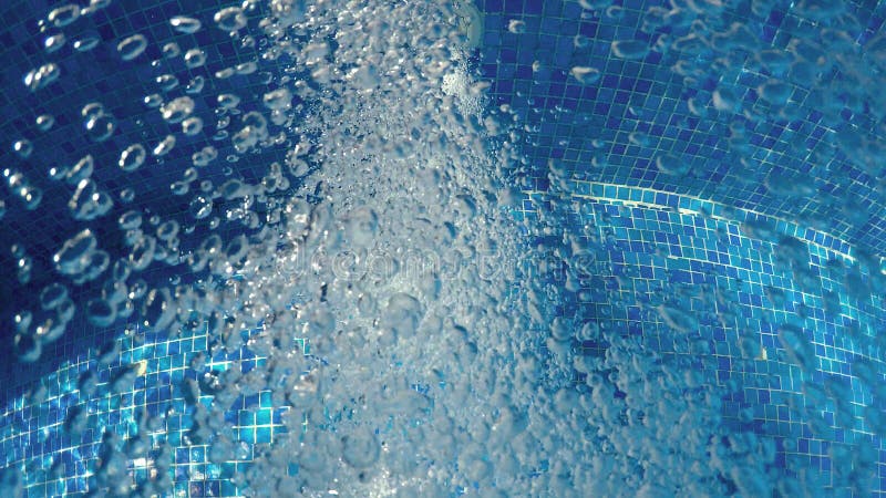 Air Bubbles from Jacuzzi Jet in Bubbly Blue Water in a Thermal Spa Pool ...