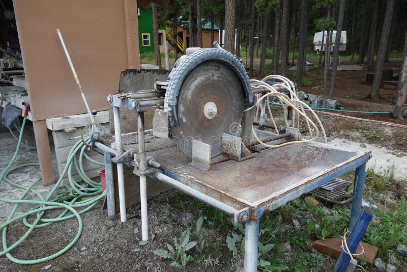 Jade being cut with a saw stock image. Image of industry - 42335103