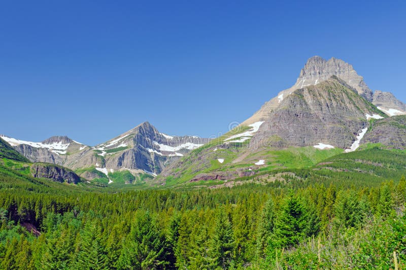 Jagged Peaks Against a Blue Sky Stock Image - Image of pretty, peaks ...