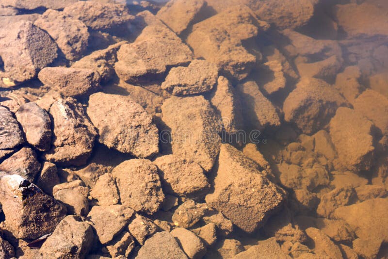 Jagged Red Rocks Underwater Stock Image - Image of shore, geology: 96699915