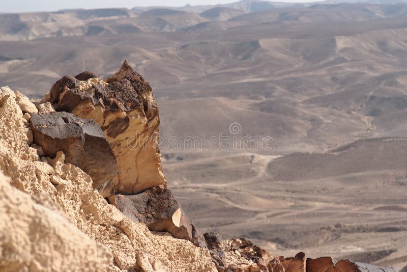 Jagged Rock on the Edge of the Cliff in the Desert Stock Photo - Image ...