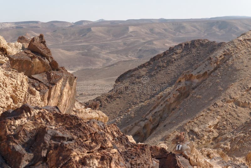 Jagged Rocks on the Edge of the Cliff in the Desert Stock Image - Image ...