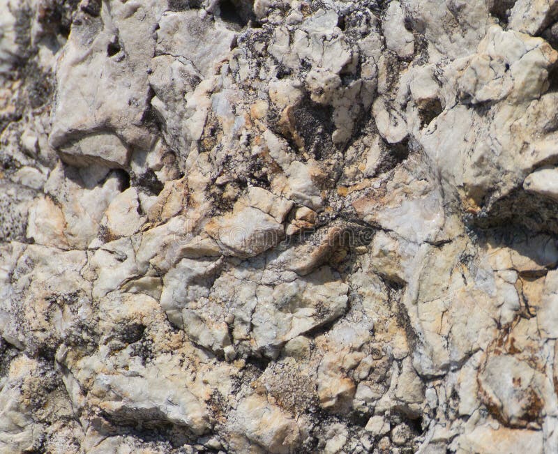Jagged, Rough Texture Stone Surface in Sunlight Stock Image - Image of ...