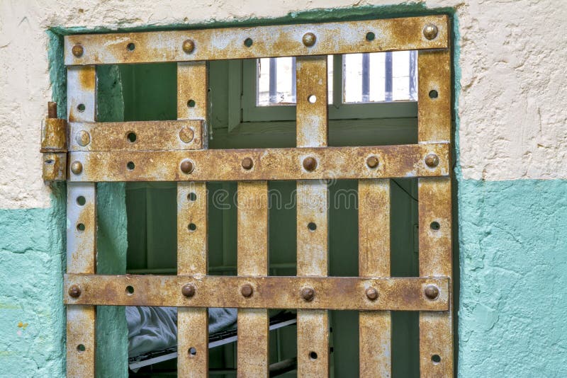 Locked Jail Cell Prison Bars Stock Image - Image of correctional ...