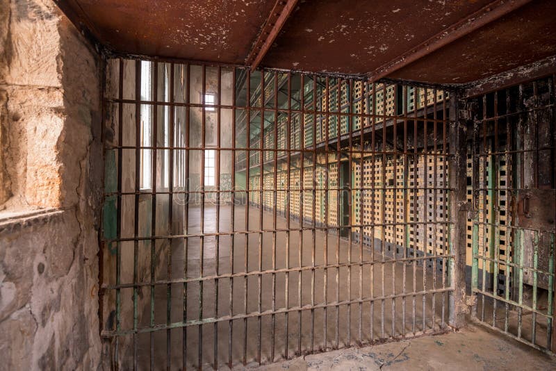 Old Rusted Jail Cell Door in Solitary Confinement Stock Photo - Image ...