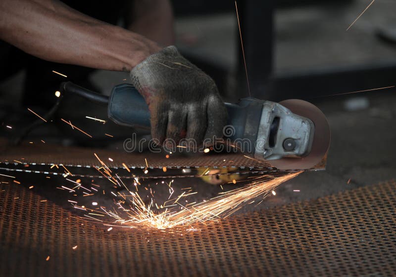 Cut the Iron Plate Using a Grinder Stock Photo - Image of hand, angle ...