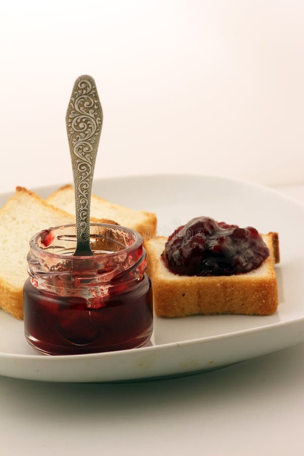 Jam and Bread on a White Plate Stock Photo - Image of bread, eating ...