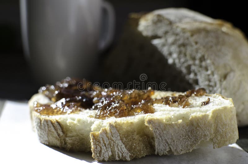 Jam spread on fresh bread stock photo. Image of studio - 38674570