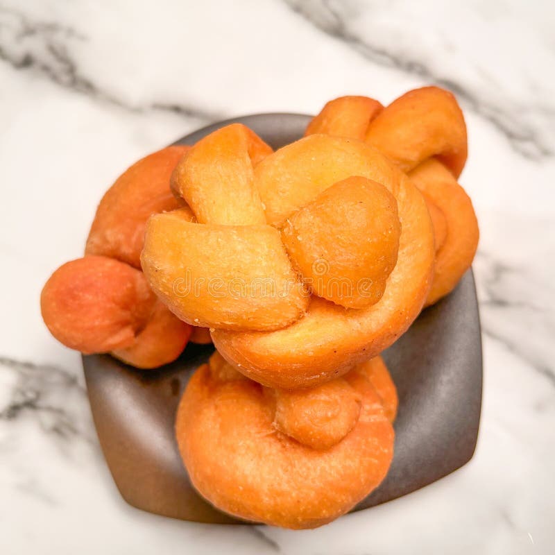 Jamaican Fried Dumpling with a Knot Stock Photo - Image of wooden, west ...