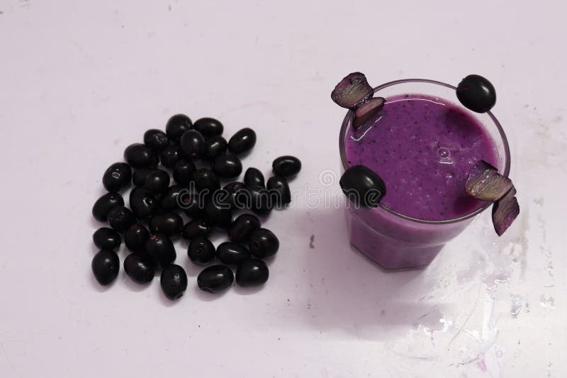 Jambolan Plum or Java Plum Juice Isolated on White Background Stock ...