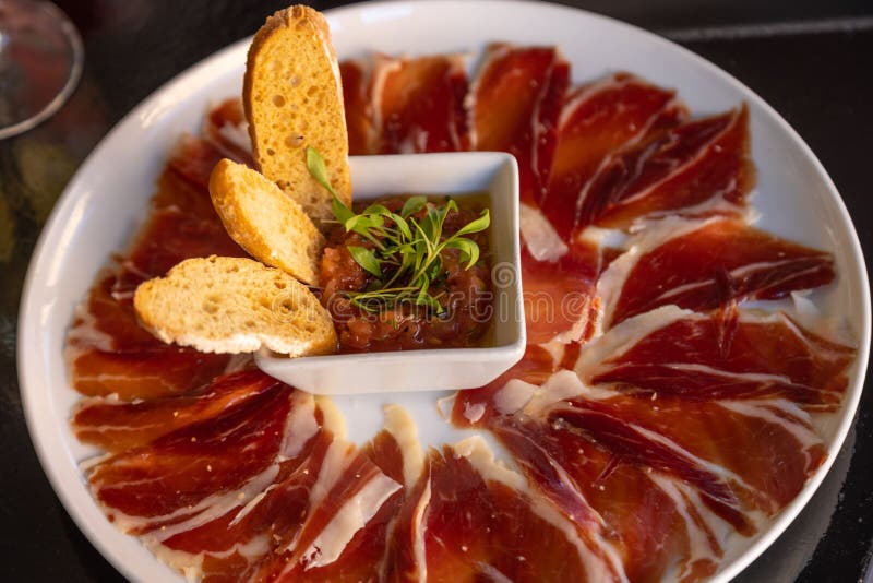 Jamon Plate with Crosinis on a Restaurant Table Stock Image - Image of ...