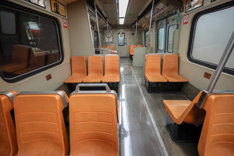 Jan 23 2025 Empty Orange-Seated Subway Train Interior with Wide Windows ...