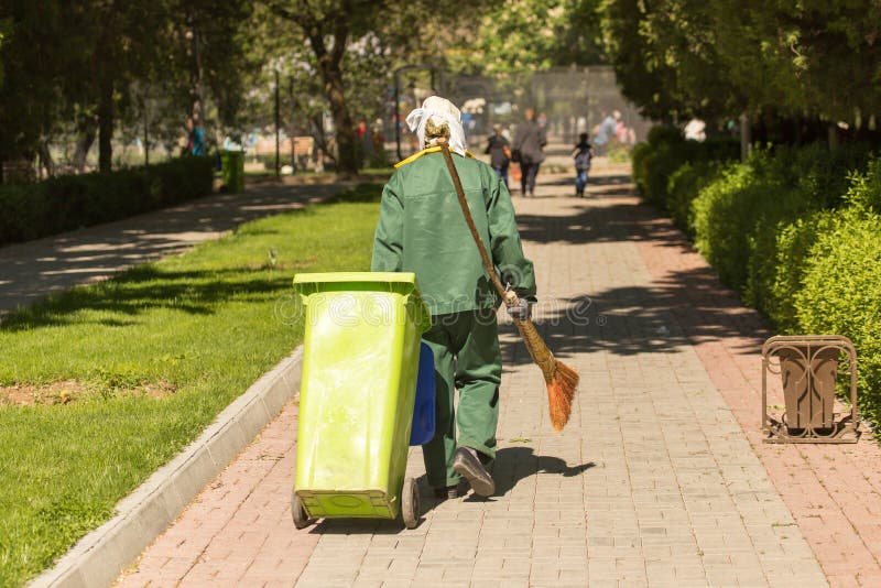 Janitor with a Broom in the Park Stock Image - Image of road, garden ...