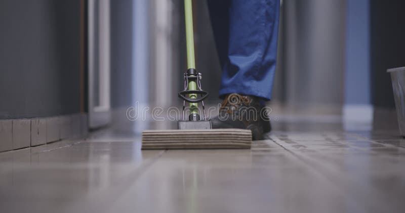 Janitor Cleaning a Corridor Stock Image - Image of indoors, building ...