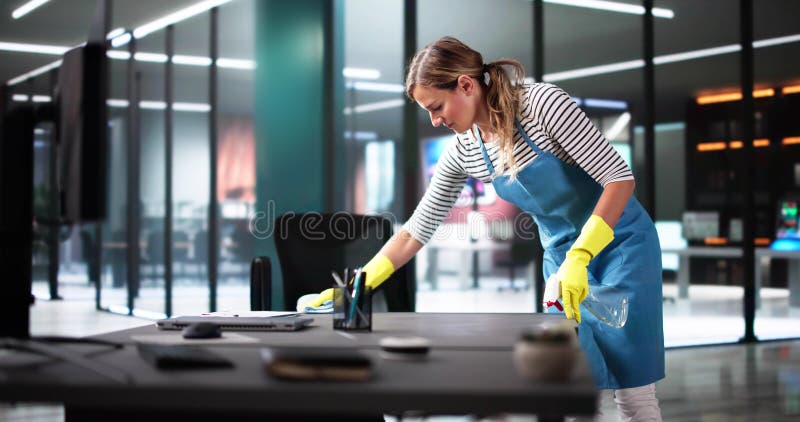 Janitor Cleaning Office Desk Stock Image - Image of products, caucasian ...