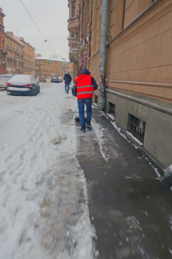 Janitor Cleaning Snow from the Sidewalk after a Snowfall Stock Image ... Janitor Cleaning Snow from the Sidewalk after a Snowfall Stock Image ...